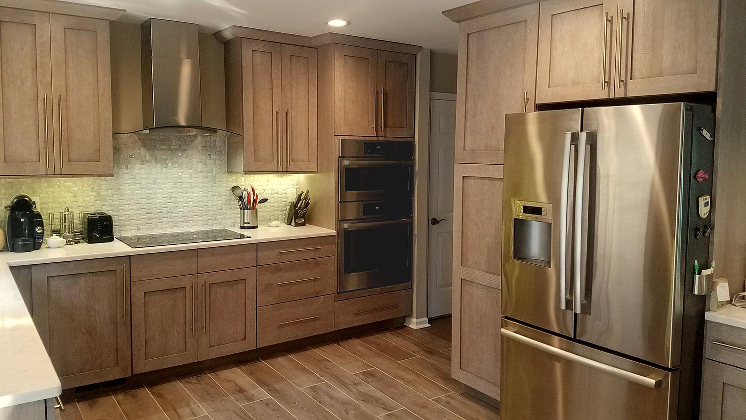 Kitchen with Omega Cabinetry designed by Reana Jones